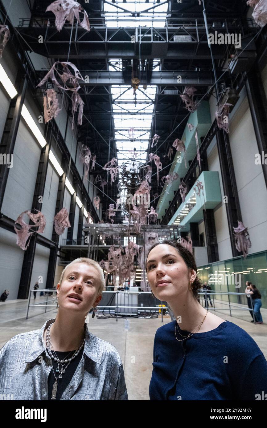 London, UK. 8 October 2024. Staff at the unveiling of ‘Open Wound’ by ...