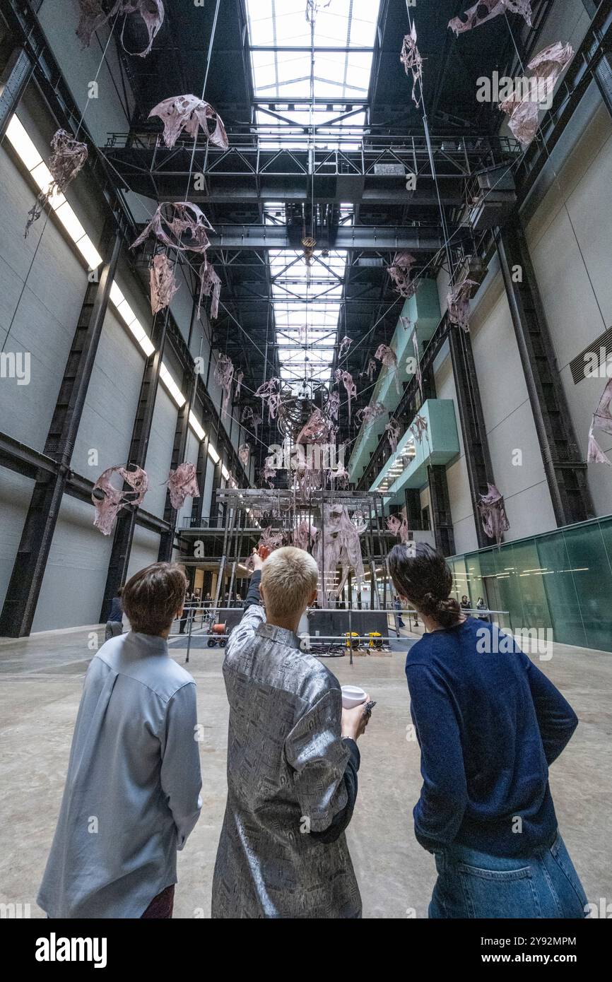 London, UK. 8 October 2024. Staff at the unveiling of ‘Open Wound’ by ...