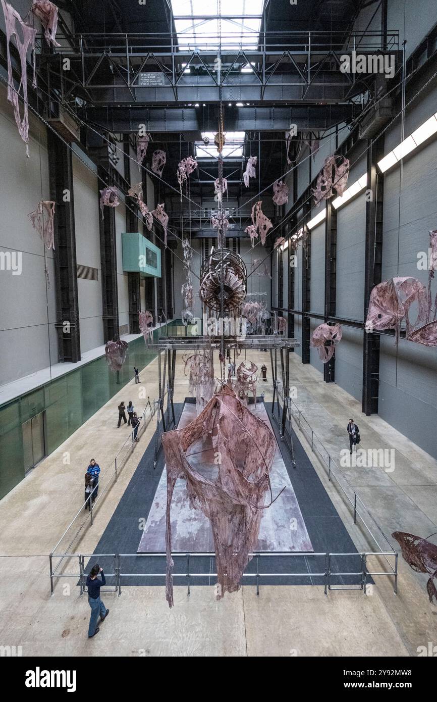 London, UK. 8 October 2024. Staff at the unveiling of ‘Open Wound’ by ...