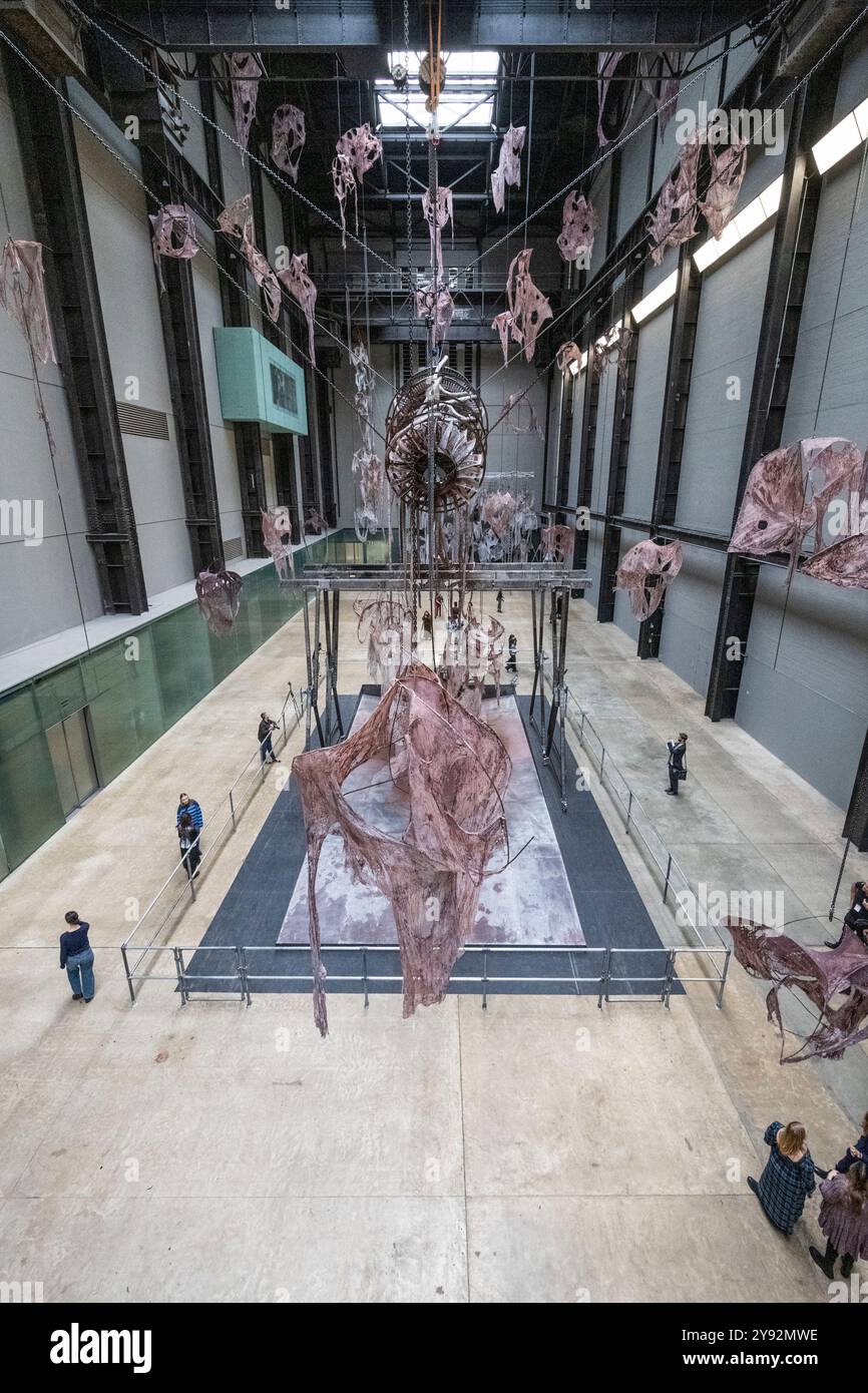 London, UK. 8 October 2024. Staff at the unveiling of ‘Open Wound’ by ...