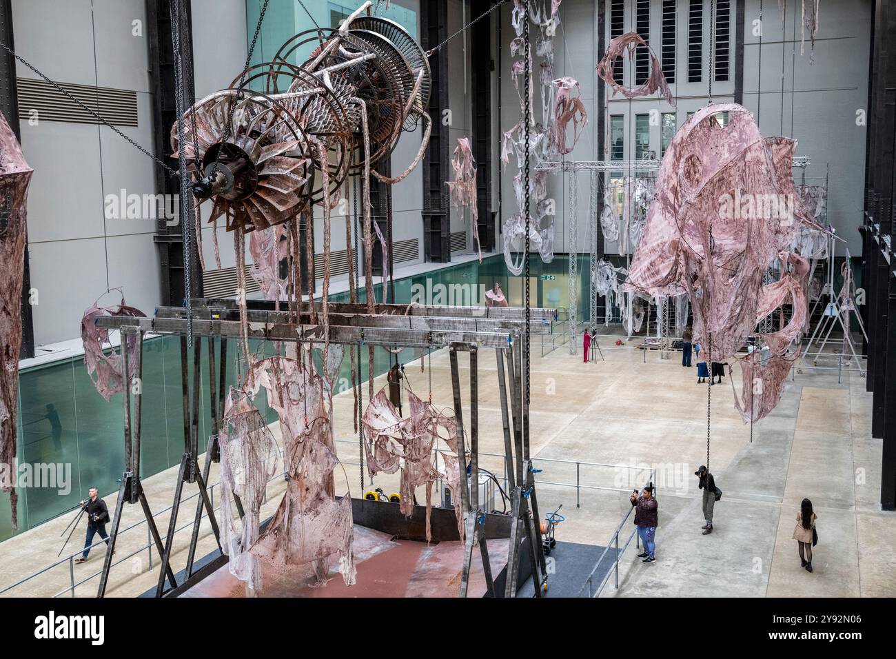 London, UK. 8 October 2024. Staff at the unveiling of ‘Open Wound’ by ...