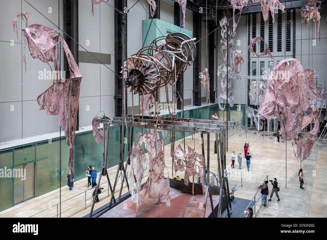 London, UK. 8 October 2024. Staff at the unveiling of ‘Open Wound’ by ...