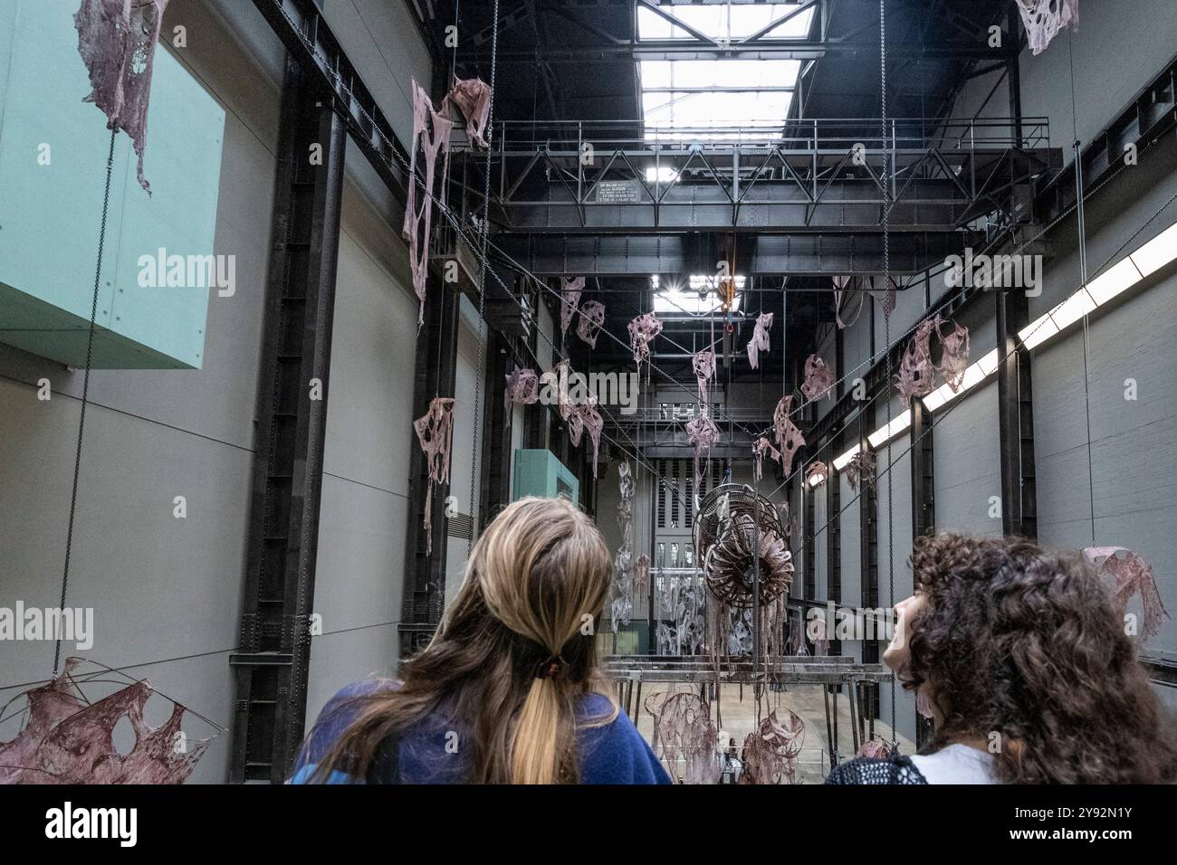 London, UK. 8 October 2024. Staff at the unveiling of ‘Open Wound’ by ...