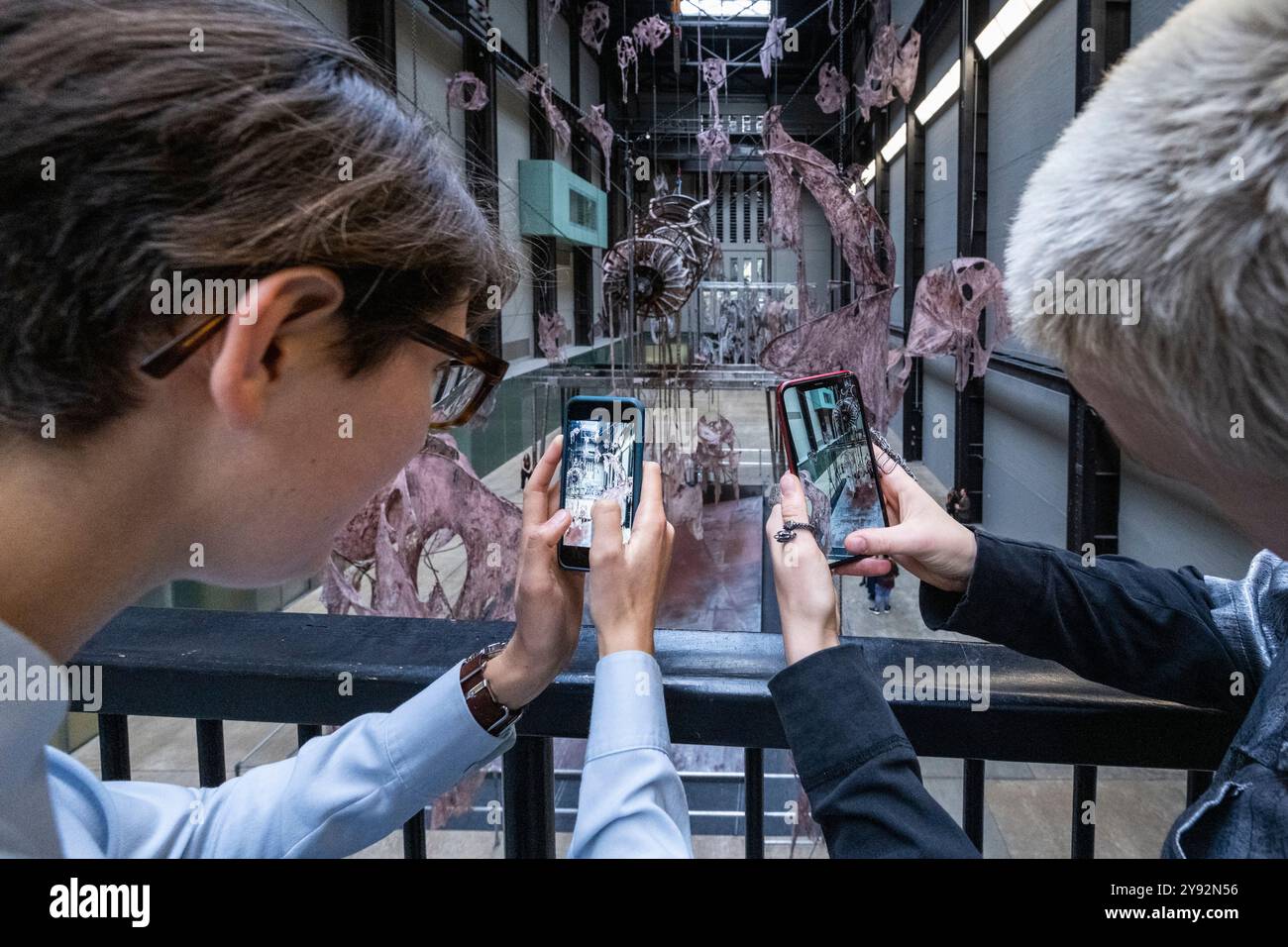 London, UK. 8 October 2024. Staff at the unveiling of ‘Open Wound’ by ...