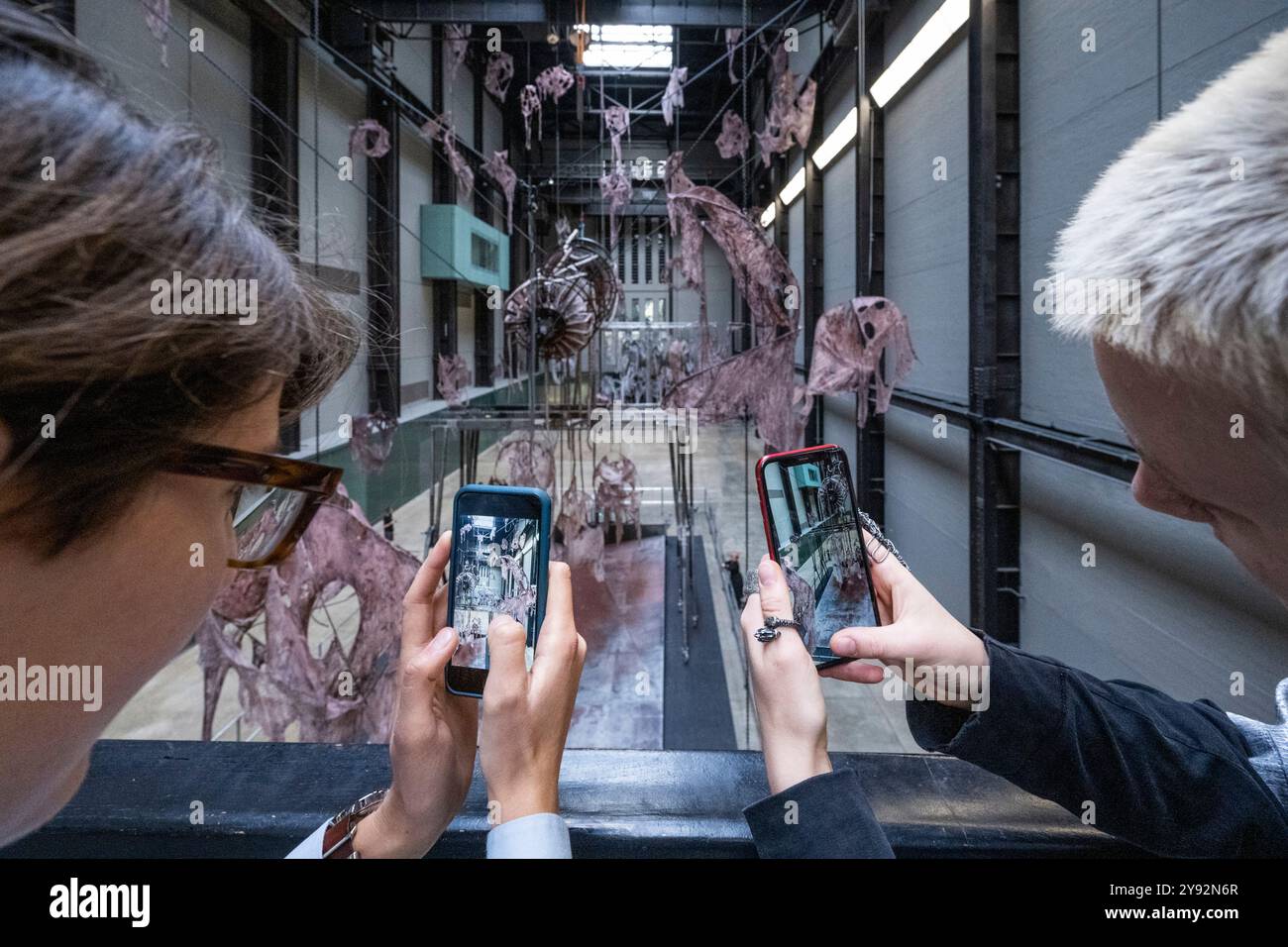 London, UK. 8 October 2024. Staff at the unveiling of ‘Open Wound’ by ...