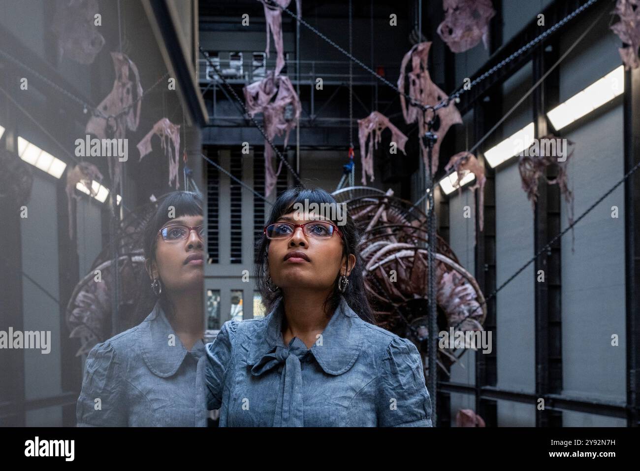 London, UK. 8 October 2024. Staff at the unveiling of ‘Open Wound’ by ...