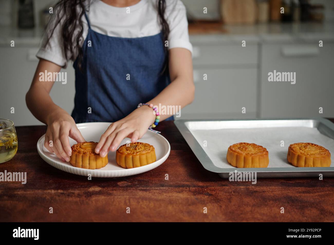 Girl Cooking Cakes At Home Stock Photo - Alamy