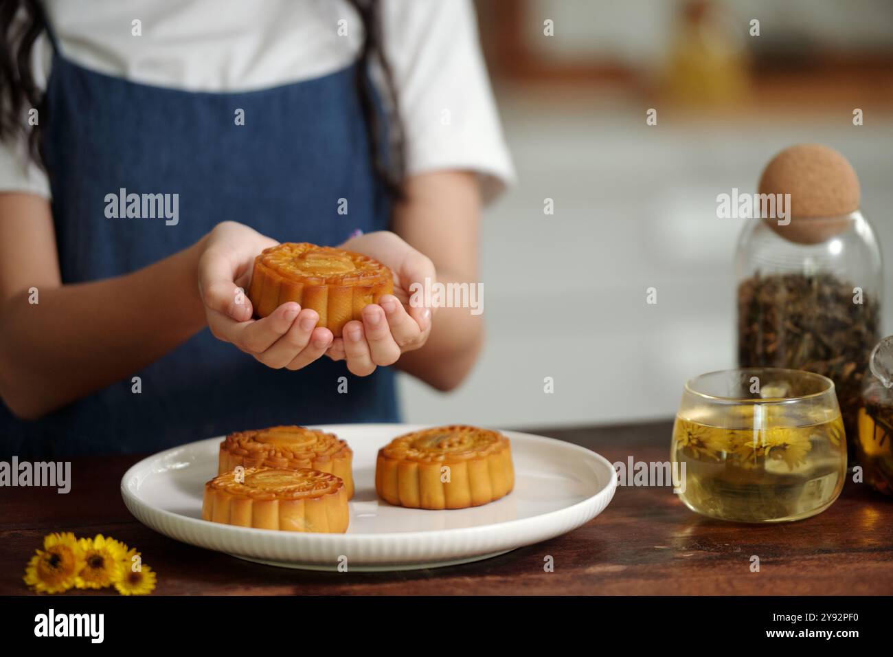 Girl With Homemade Moon Cakes Stock Photo - Alamy