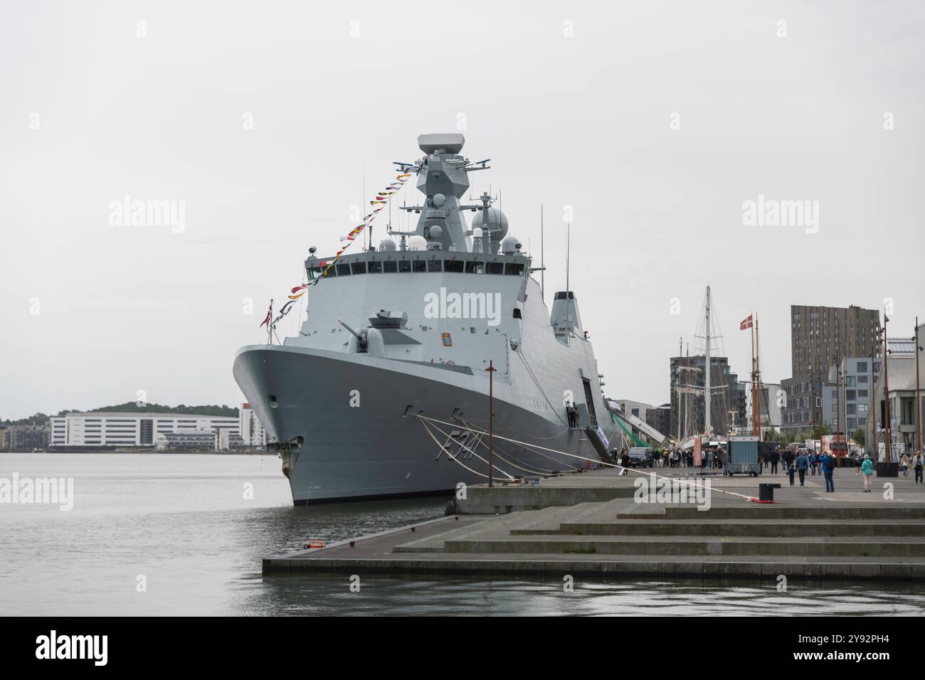 Modern Naval Warship Docked at Urban Waterfront Harbor Stock Photo - Alamy
