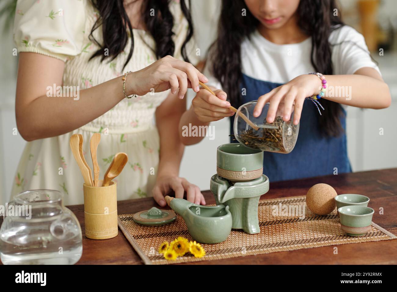 Woman brewing black tea hi-res stock photography and images - Alamy