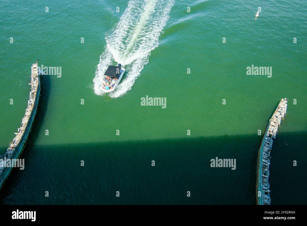 Clearwater, FL, USA - 02 Oct 2024 - A pleasure boat entering a channel ...