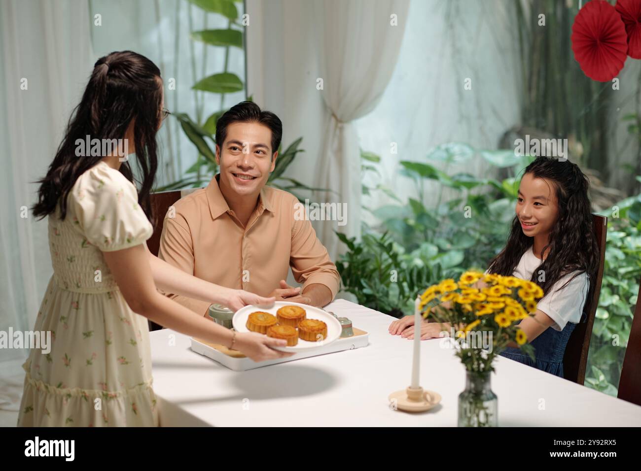 Woman Serving Baked Cake For Dessert Stock Photo - Alamy