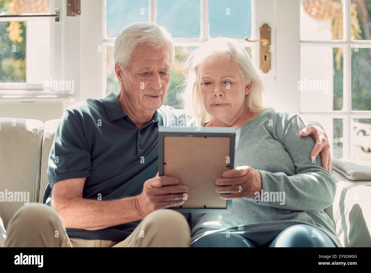 Senior couple, memory and picture frame for nostalgia, history or ...