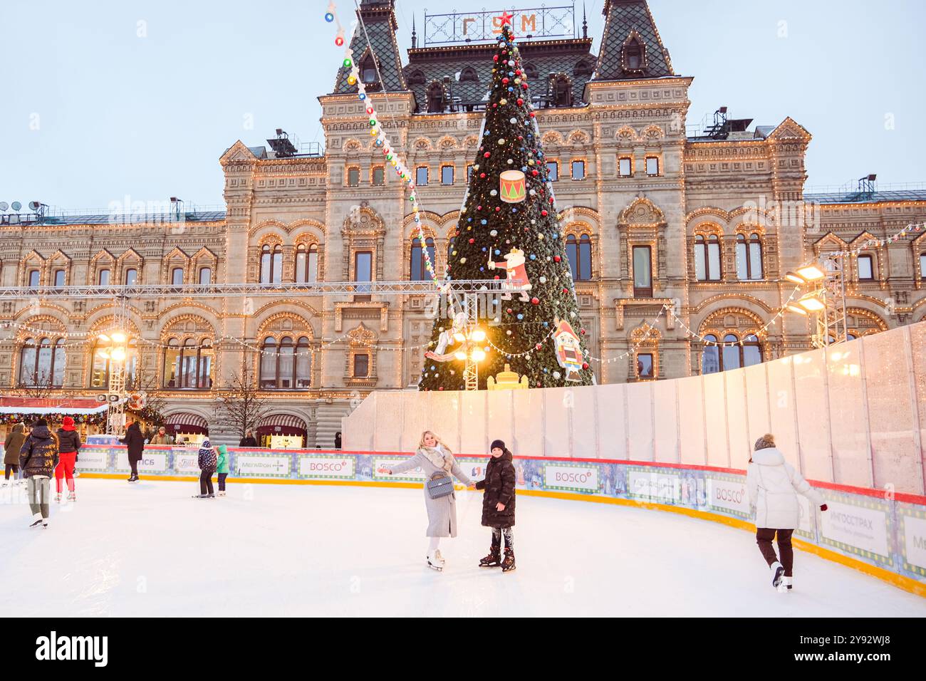 Mother and son on the skating rink on Red Square 2021 Stock Photo - Alamy