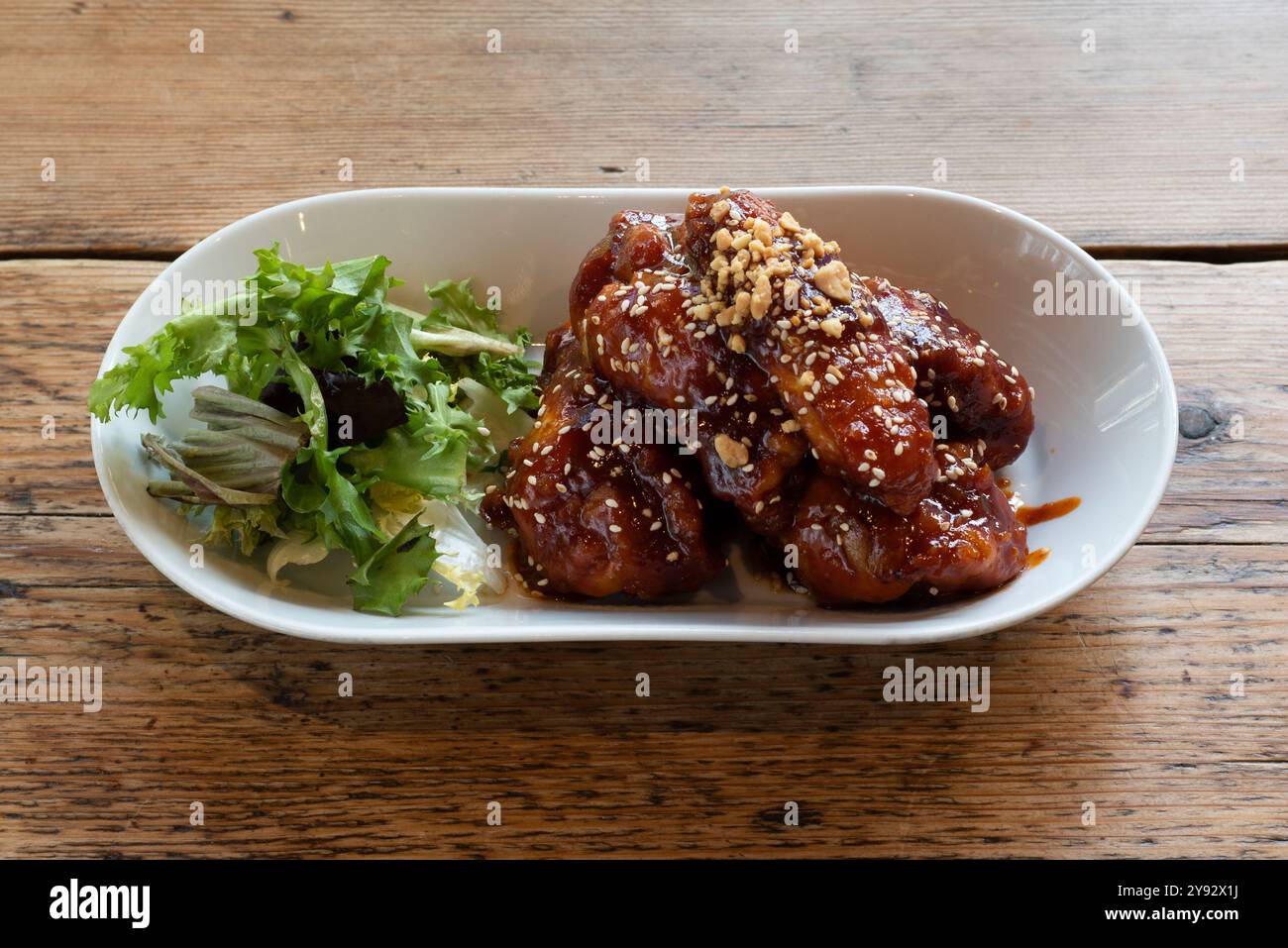 Korean chicken chicken wings, marinated in a spicy bbq sauce starter or ...