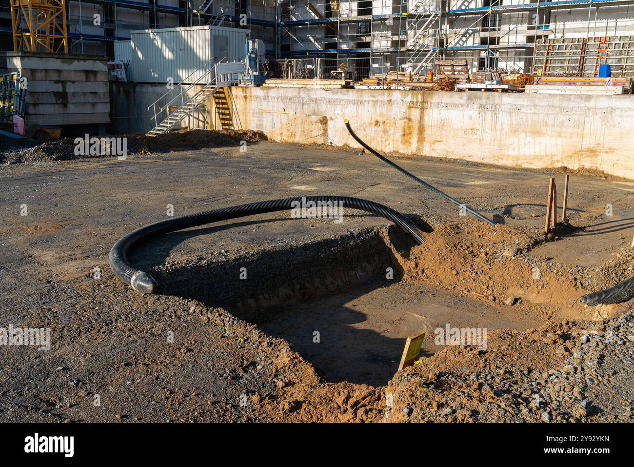 Heavy machinery and tools are set up at a construction site where ...