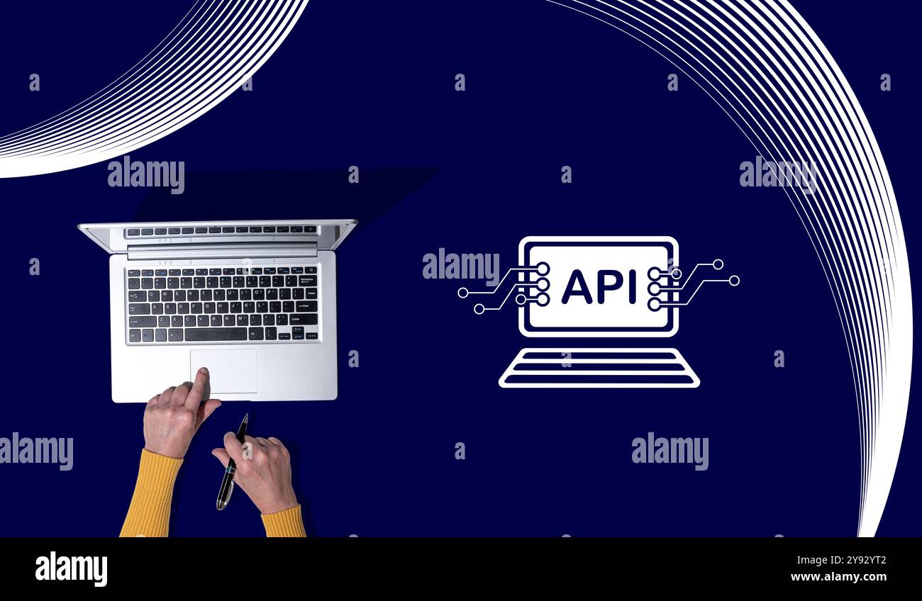 Top view of hands using laptop with symbol of api concept Stock Photo ...