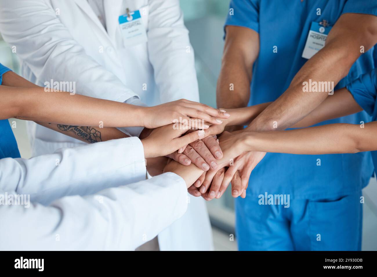 Hospital, medical team and hands with huddle for teamwork ...