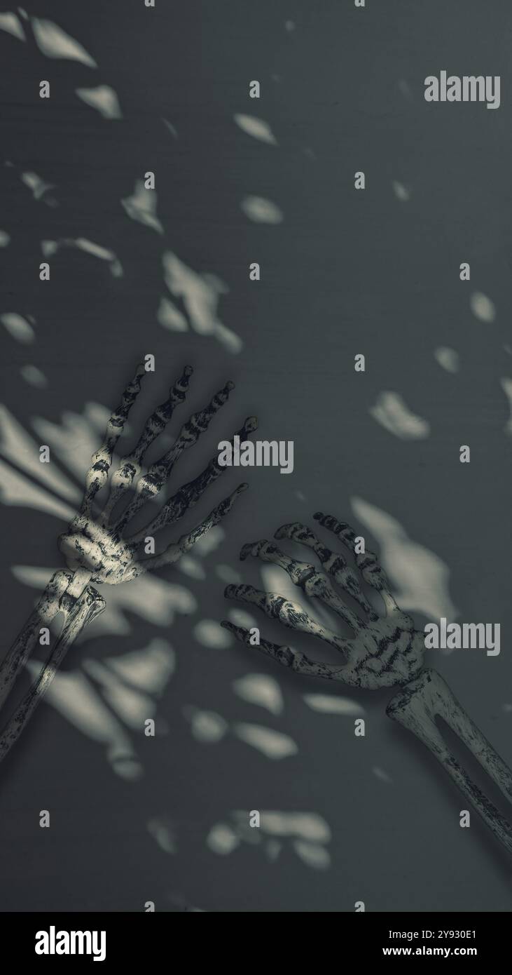 Human skeleton hand reaching out in wall, with a creepy, dark and scary ...