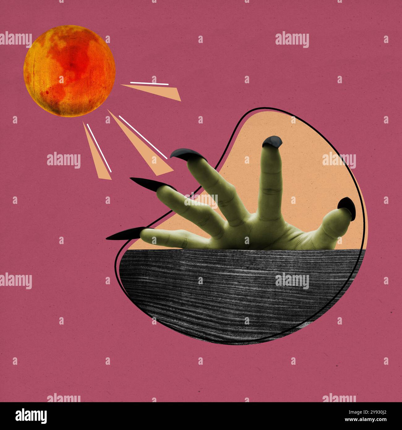 Witch hand with long nail claw reaching out from wooden board. Scene is ...