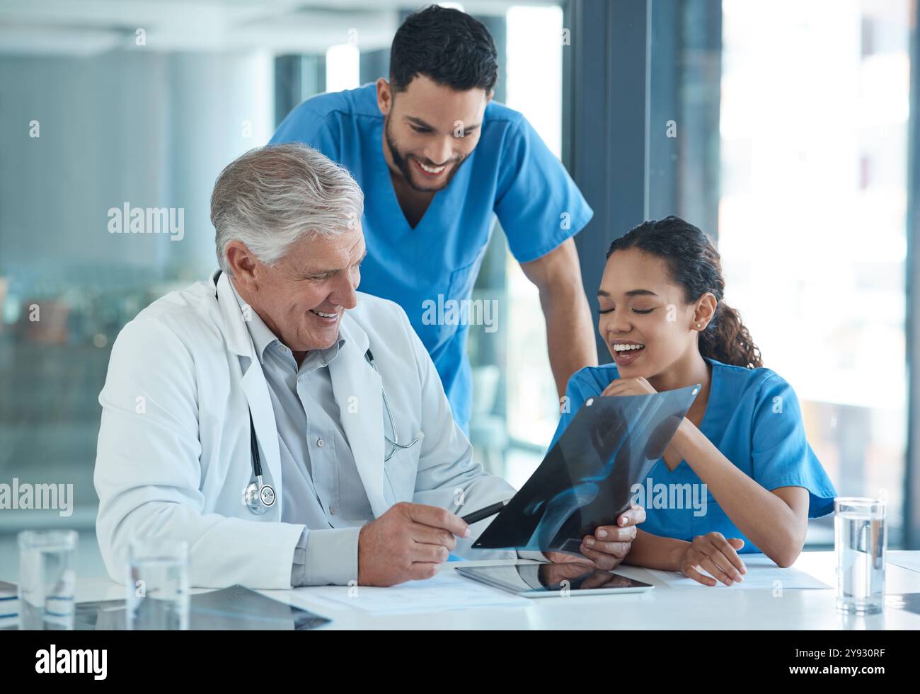 Medical group, discussion and happy people with x ray in meeting for ...