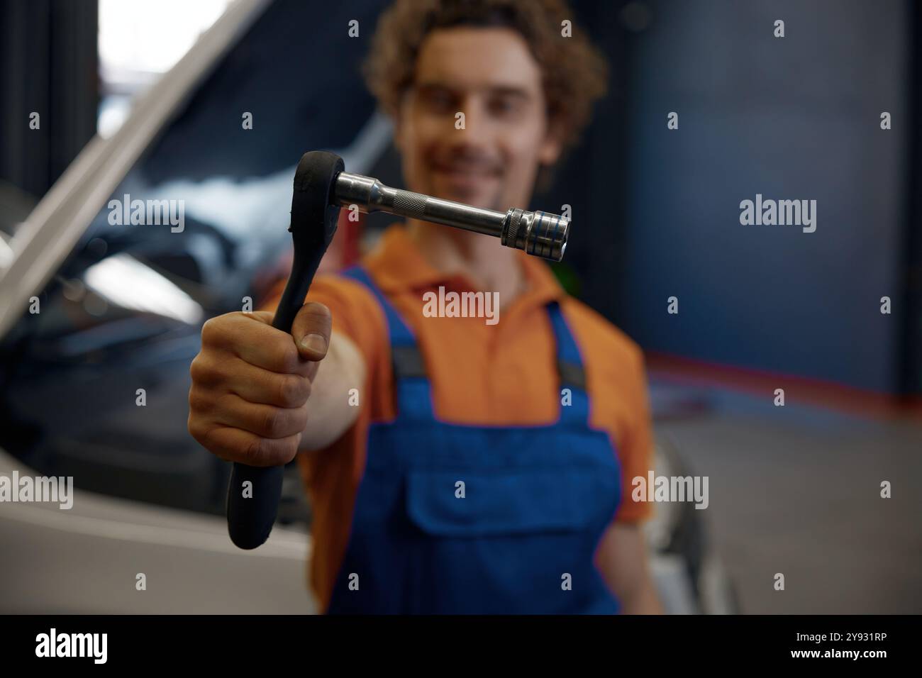 Hand holding ratchet wrench hi-res stock photography and images - Alamy