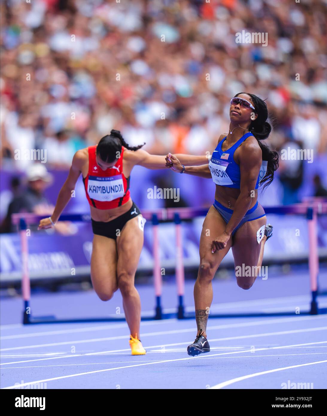 Alaysha Johnson participating in the 100 meters hurdles at the Paris ...