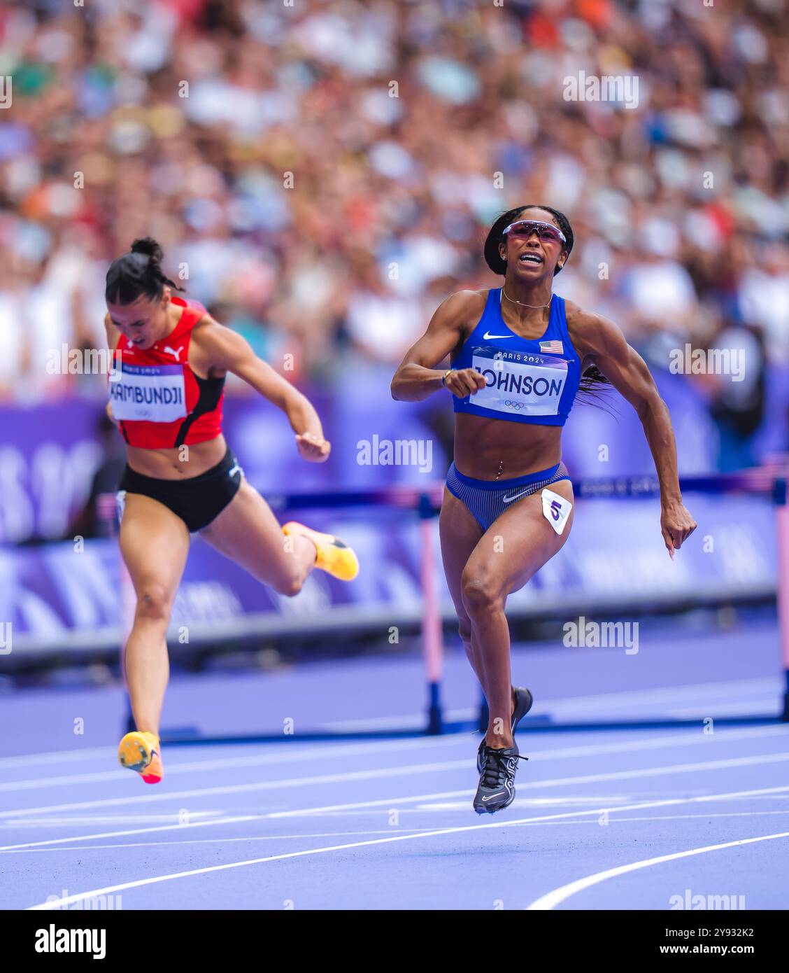 Alaysha Johnson participating in the 100 meters hurdles at the Paris ...