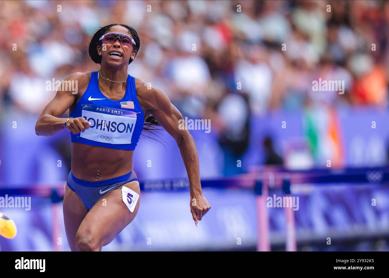 Alaysha Johnson participating in the 100 meters hurdles at the Paris ...