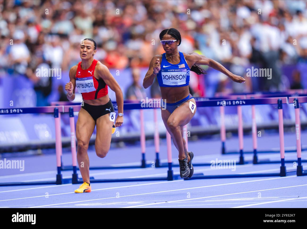 Alaysha Johnson participating in the 100 meters hurdles at the Paris ...
