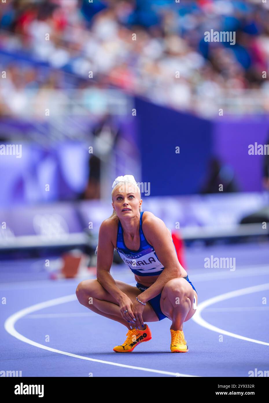 Lotta Harala participating in the 100 meters hurdles at the Paris 2024 ...