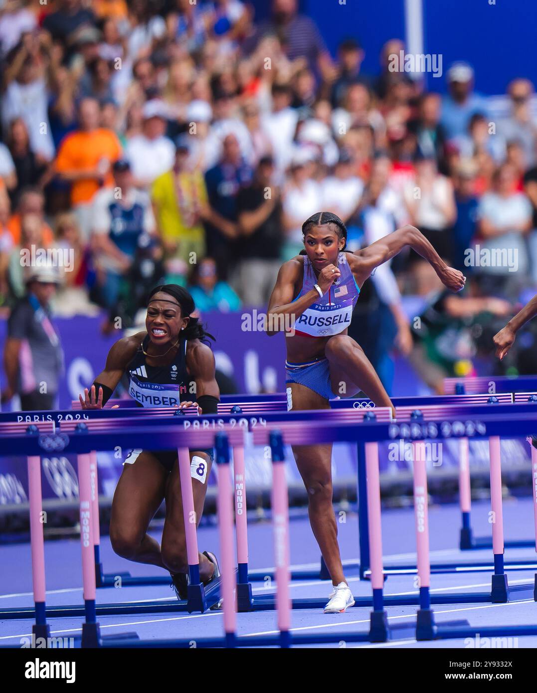 Masai Russell participating in the 100 meters hurdles at the Paris 2024 ...