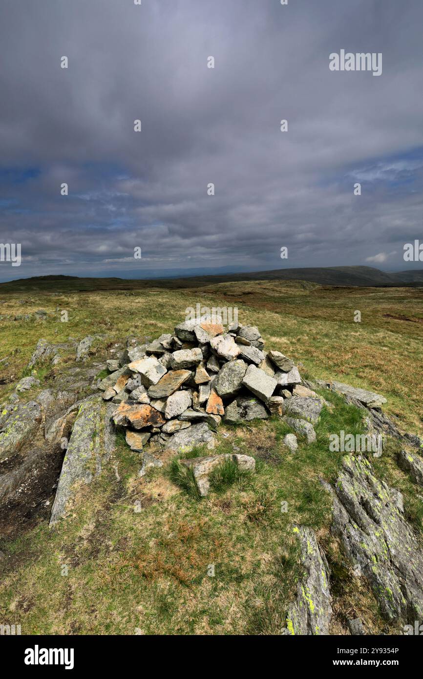 The summit cairn of Grey Crag fell, above the hamlet of Sadgill ...