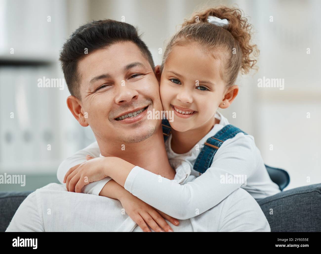 Sofa, father and girl in portrait for hug, connection and bonding ...