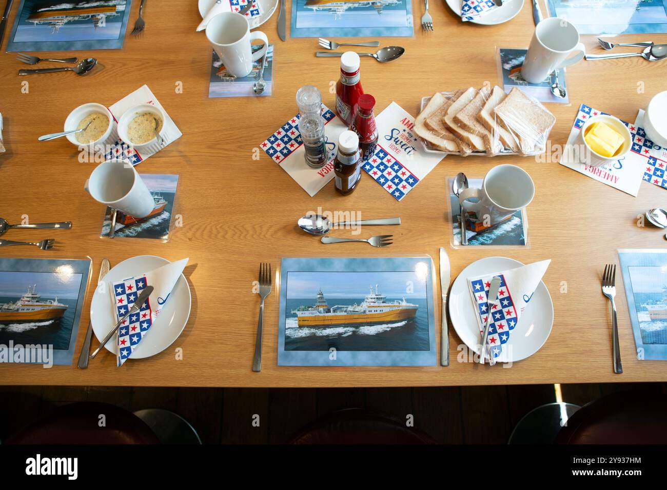 Table mats with a picture of the Kirkella in the restaurant/eating area ...