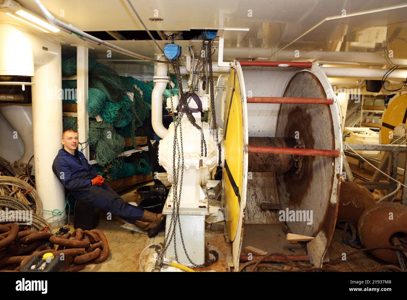A Deckhand draining pipes onboard the Kirkella. The Kirkella is a ...