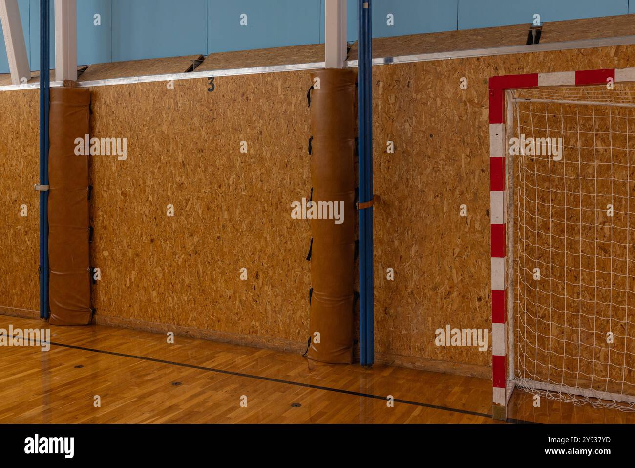 Indoor Handball Court with Goal Post and Wooden Walls in Gymnasium ...