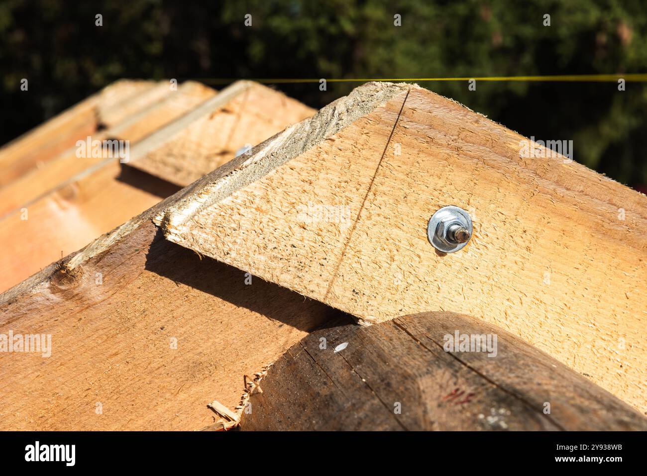 Rafters and ridge beam log. Background photo with selective soft focus ...