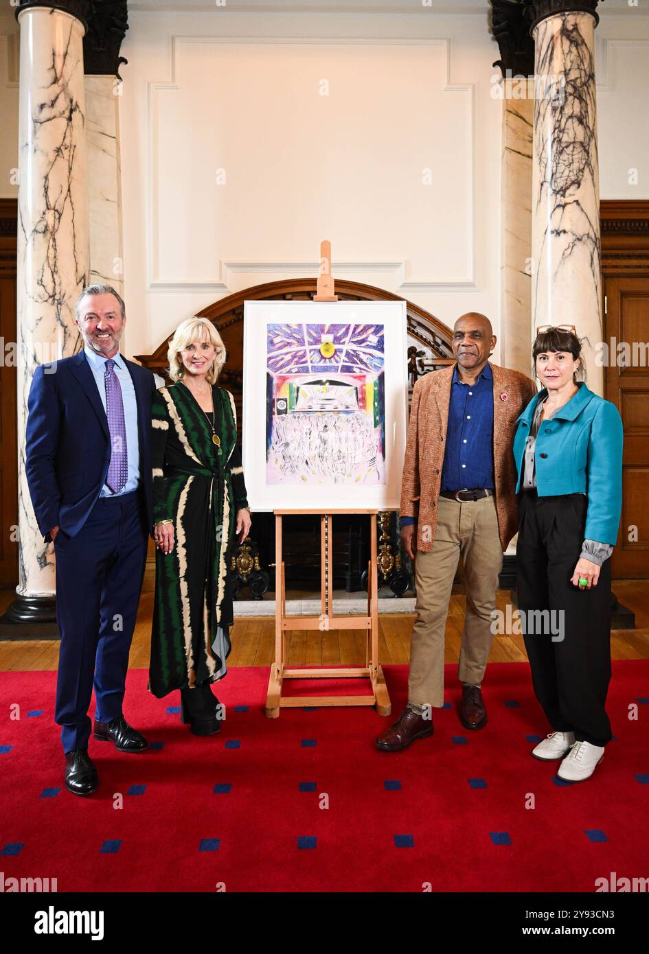 EDITORIAL USE ONLY British artist Denzil Forrester (second right) is ...