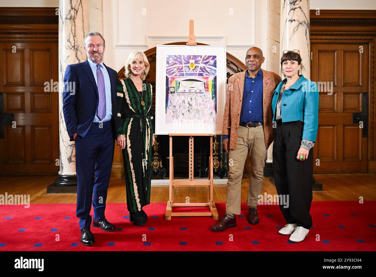 EDITORIAL USE ONLY British artist Denzil Forrester (second right) is ...