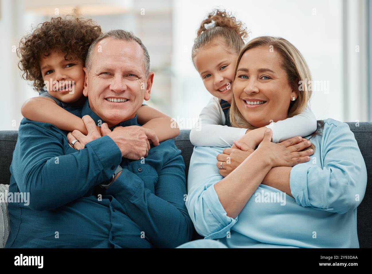 Sofa, grandparents and children in portrait with hug, connection and ...