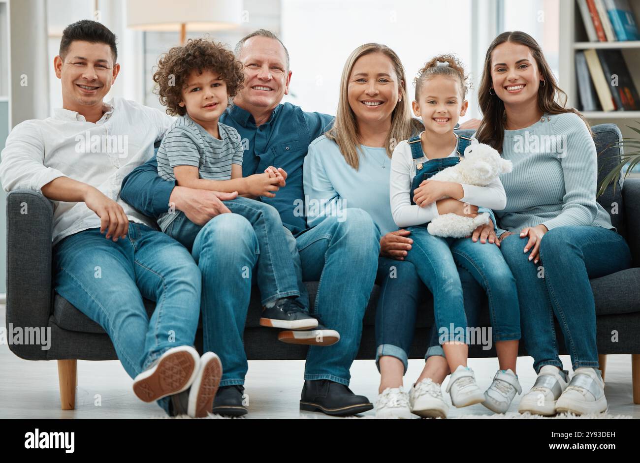Sofa, grandparents and parents in portrait with kids, connection and ...