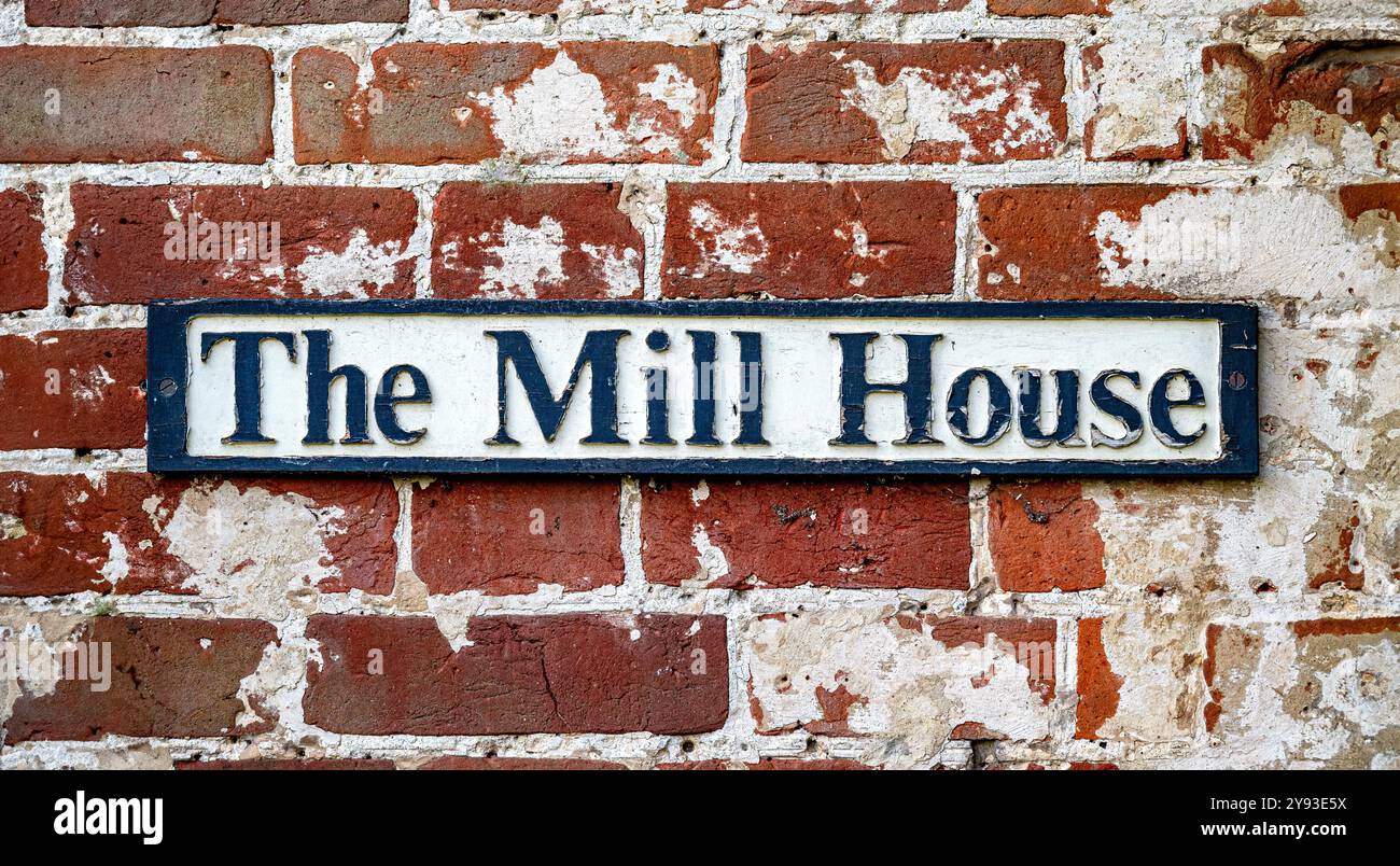 Wall sign of "The Mill House" at Flatford Mill made famous by John ...