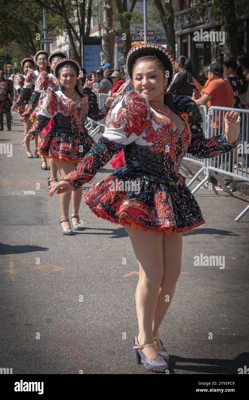 Bolivian dancers in colorful costumes at the Hispanic Heritage Parade ...