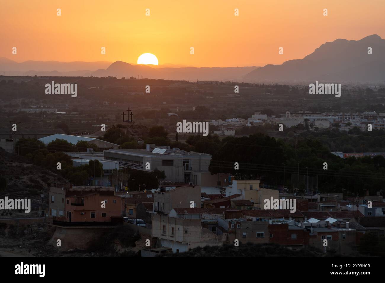 Sunset behind the Spanish town of Rojales in the community of Valencia ...