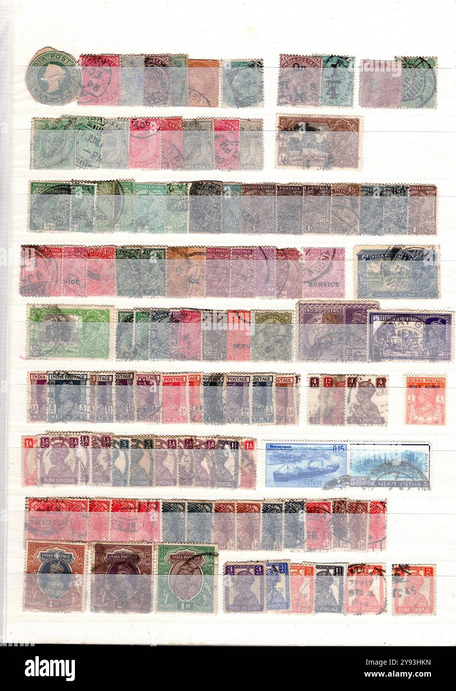 A stamp album page filled with vintage postage stamps from India Stock ...