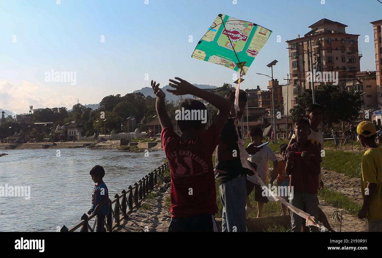 October 8, 2024: Kids fly a kite in celebration of Dashain festival in ...