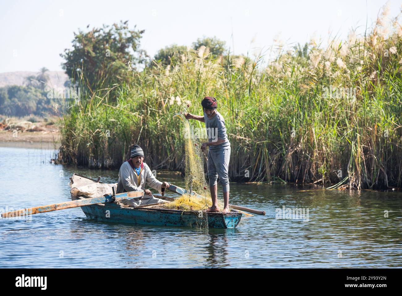 Net fishermen in rowing boat, village of Ramadi, west bank of the Nile ...