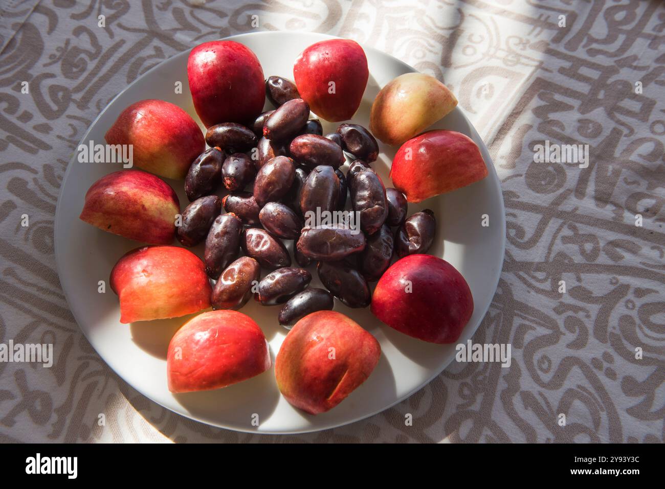 Fruit plate of dates and apple served aboard the Dahabeah, passenger ...