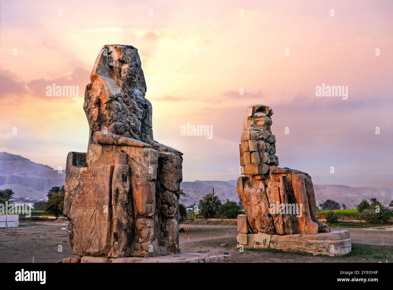 Colossi of Memnon, massive stone statues of Pharaoh Amenhotep III in ...